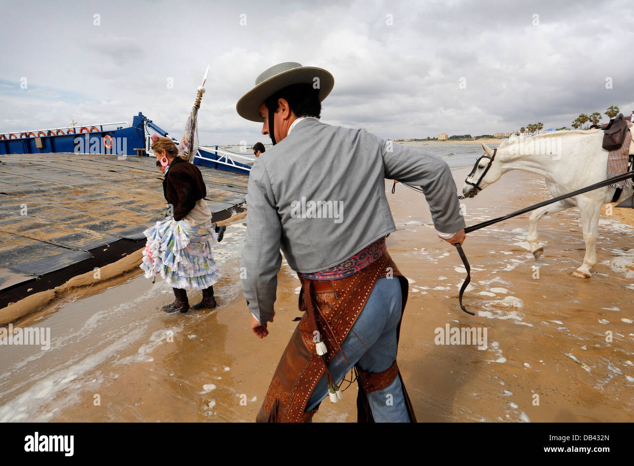 Spanish Catholic pilgrims boarding a ferry on the annual pilgrimage to ...