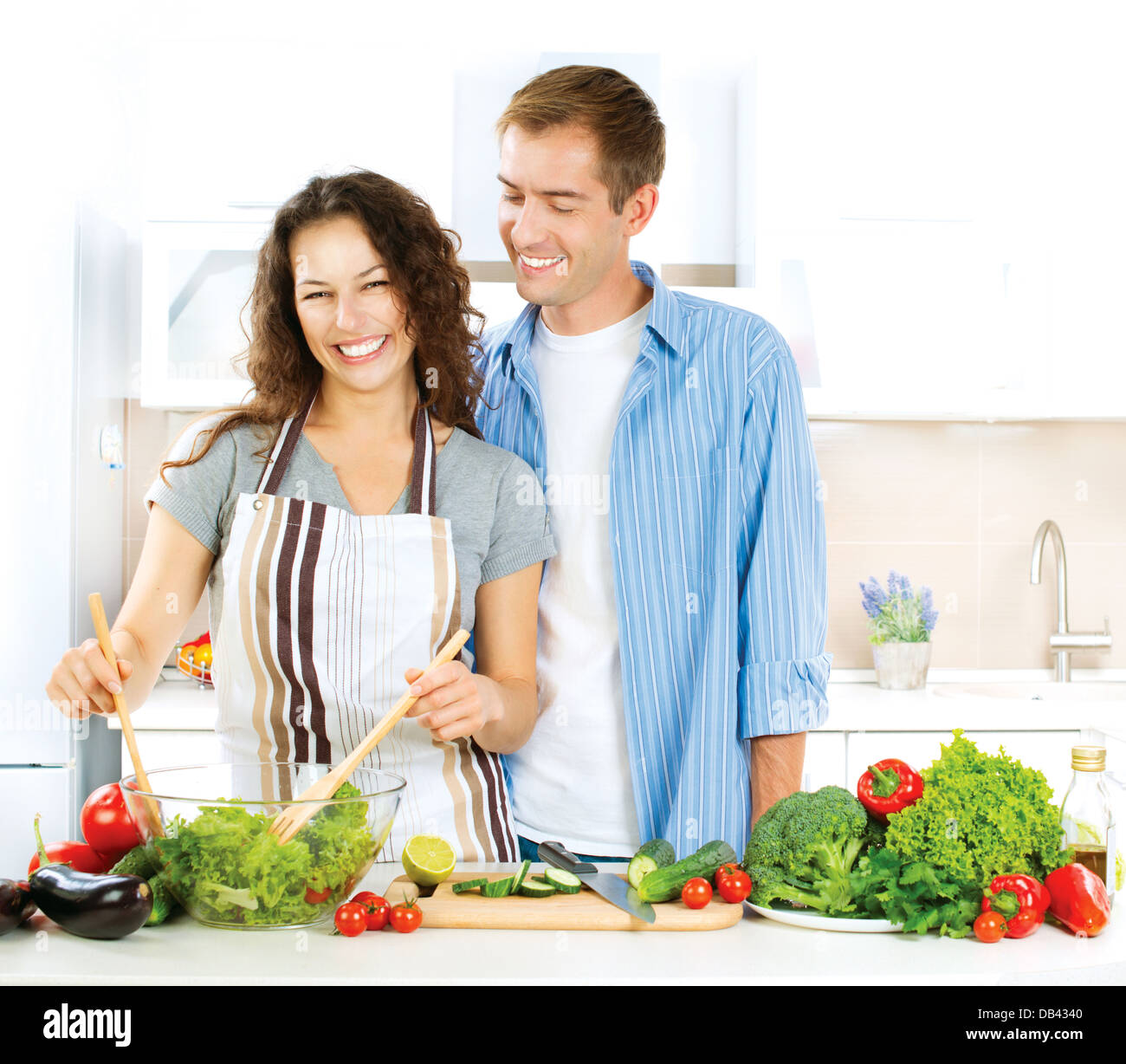 Happy Couple Cooking Together. Dieting. Healthy Food Stock Photo - Alamy