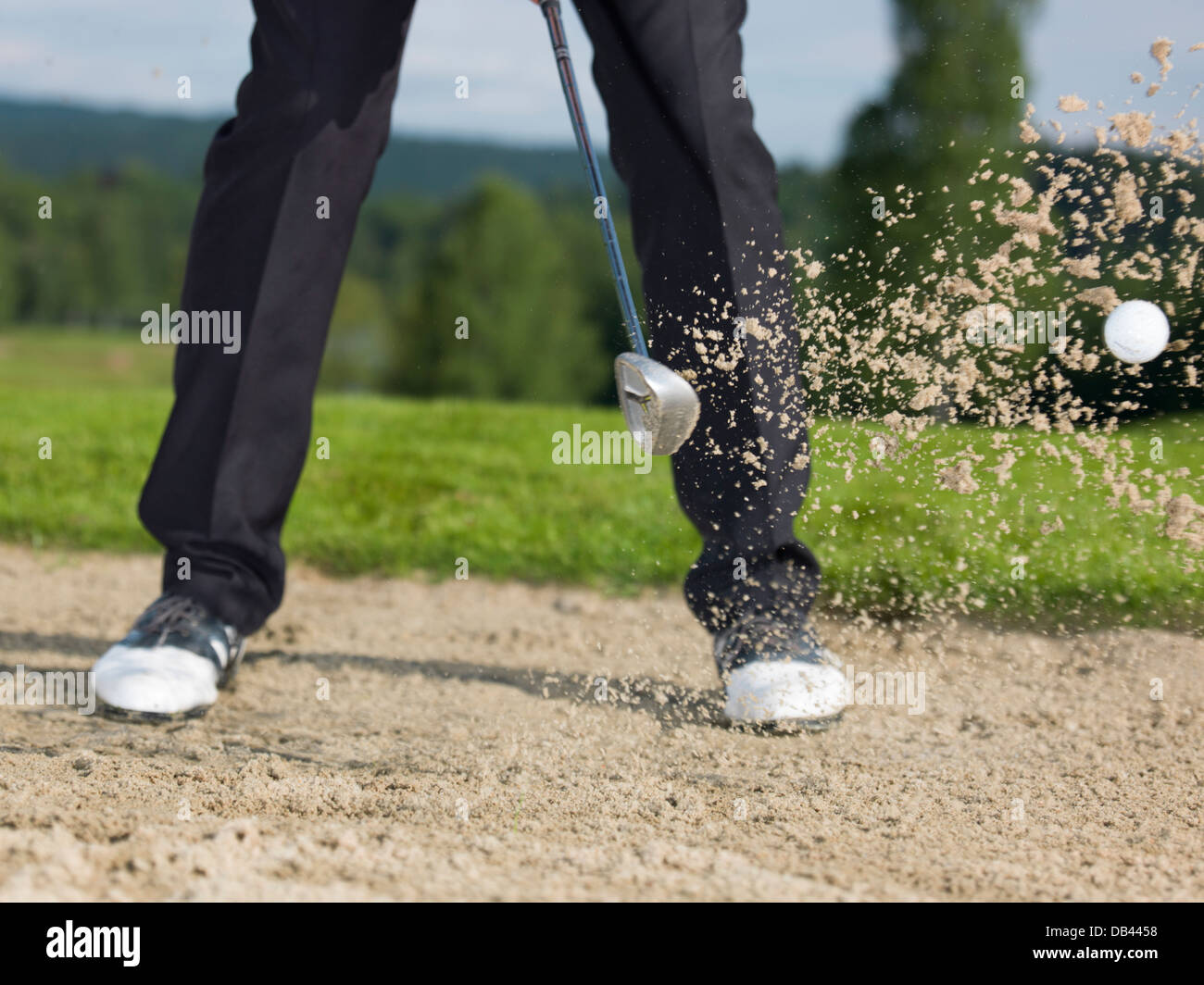 Golf action sand bunker hi-res stock photography and images - Alamy