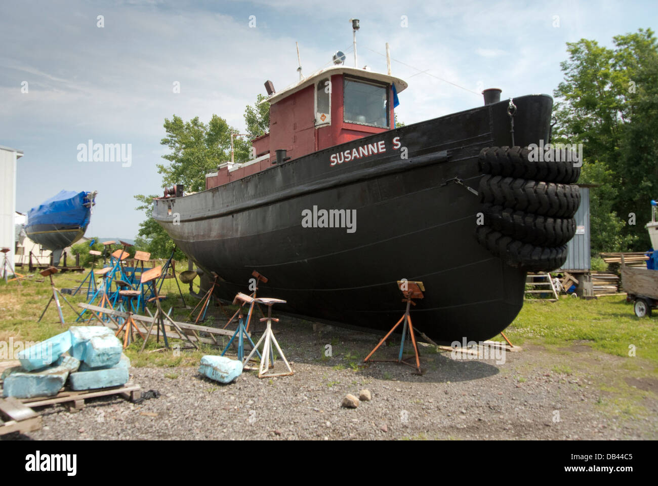 Tugboat in drydock Stock Photo - Alamy