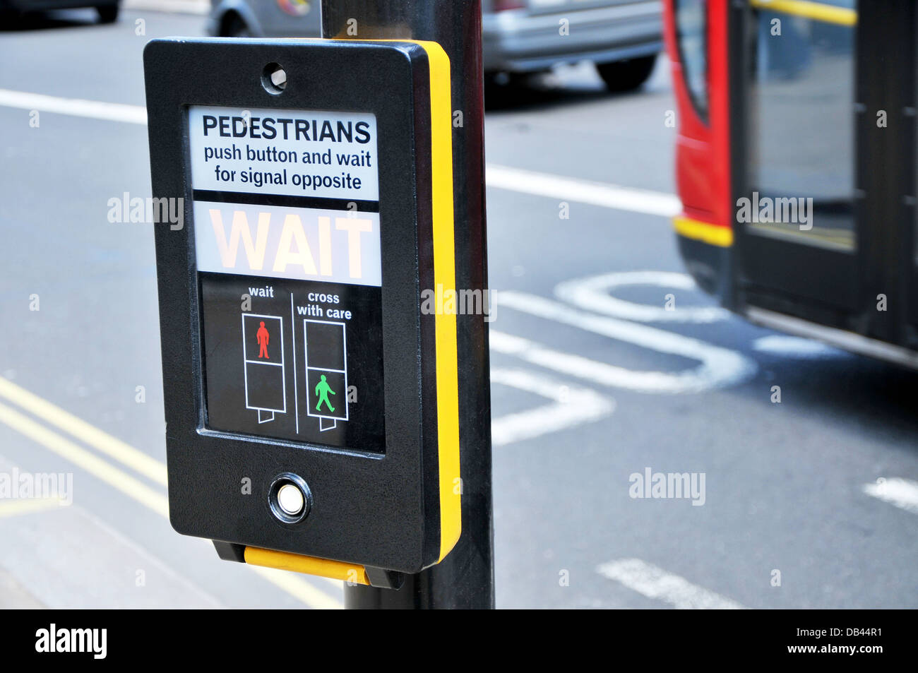 Push button at a pedestrian road crossing with traffic lights Stock ...