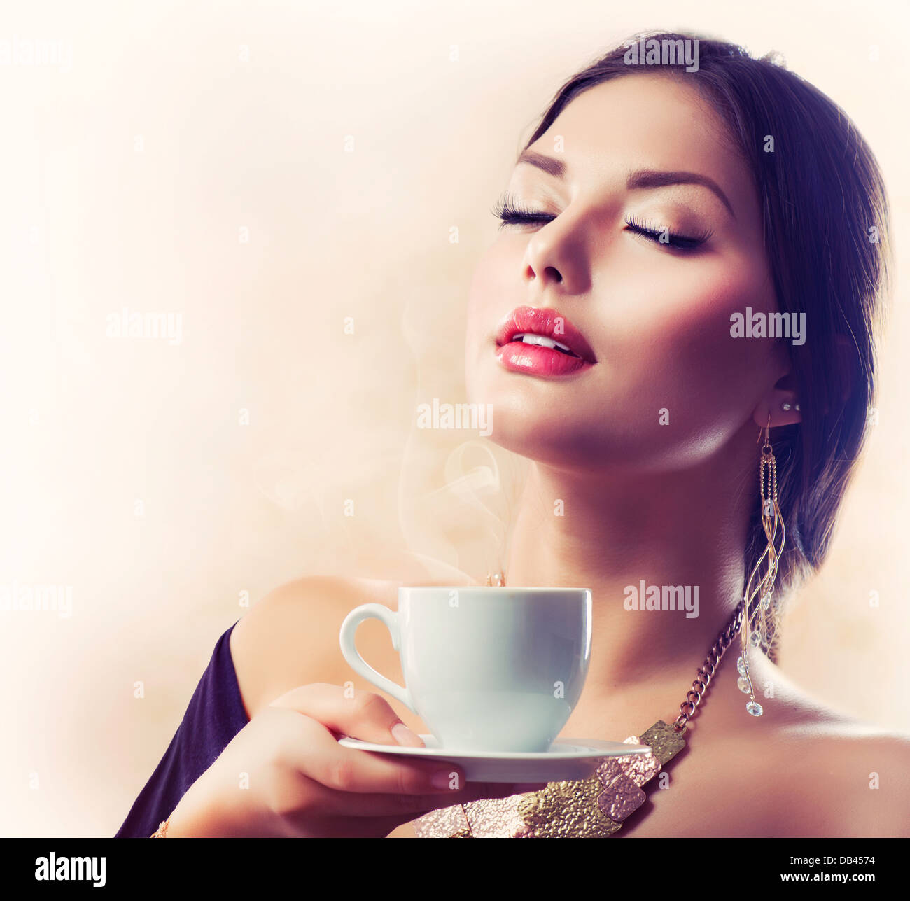Vintage woman drinking tea hi-res stock photography and images - Alamy