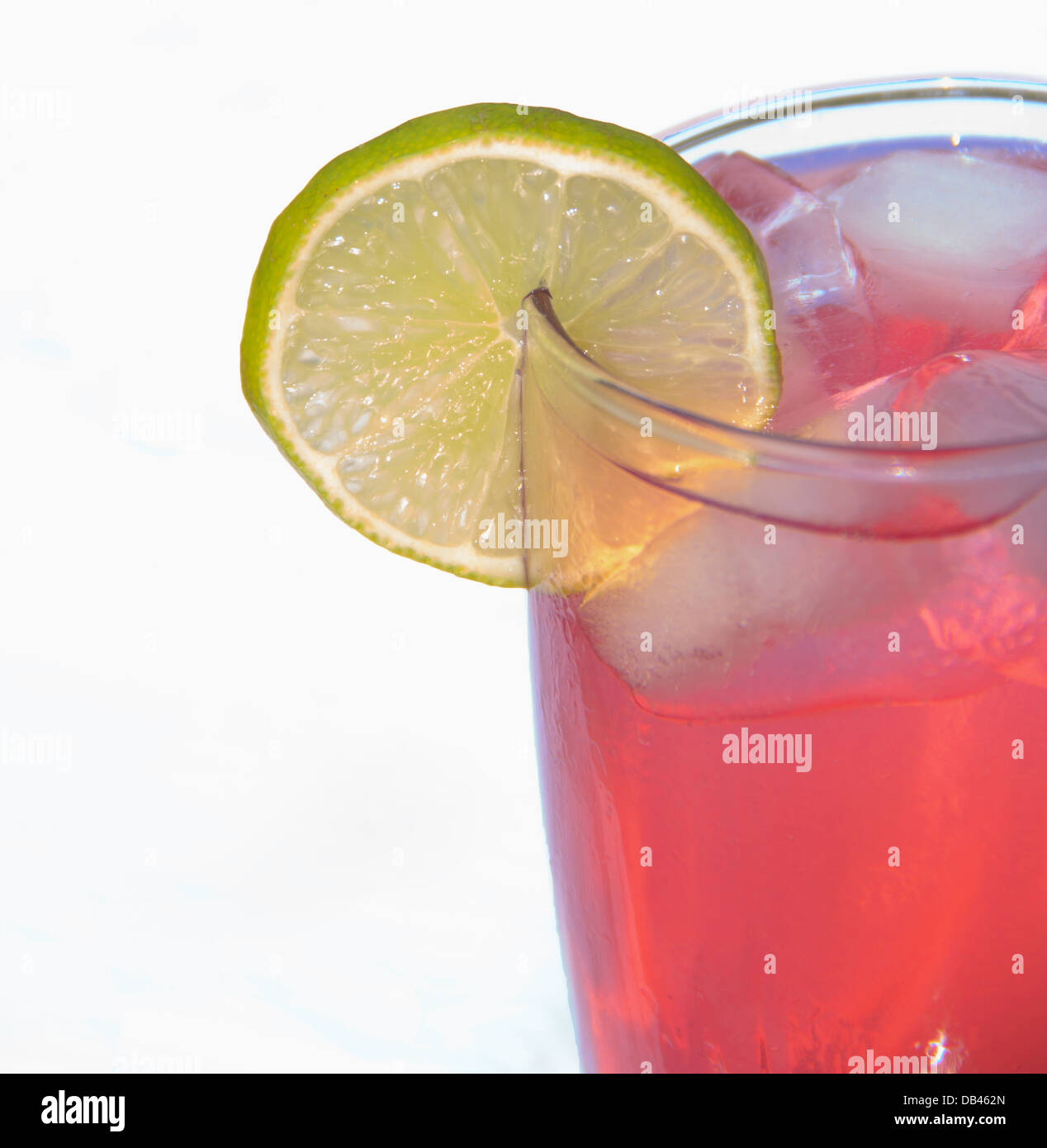 Pink Beverage with a lime slice Stock Photo - Alamy