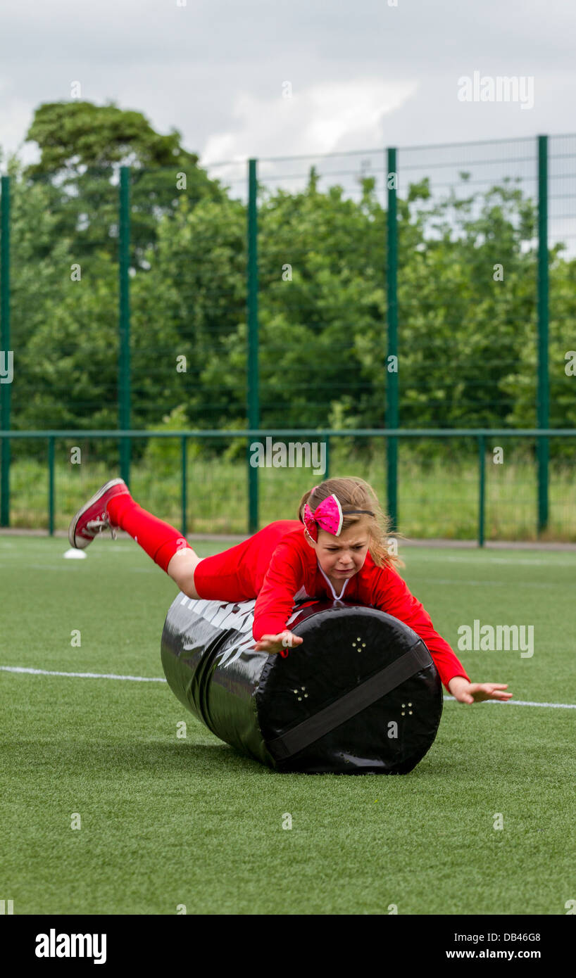 a young girl training for the sport of rugby Stock Photo - Alamy