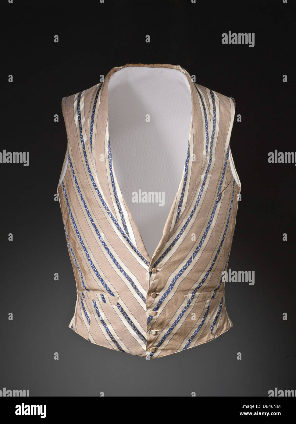 A man's vest with removable chest pads, part of a historical collection ...