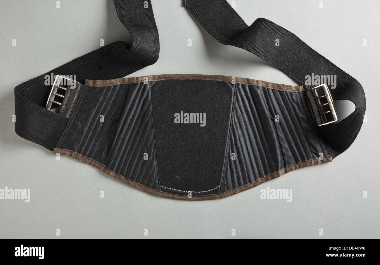 This man's waist binder, a functional and decorative garment, reflects ...