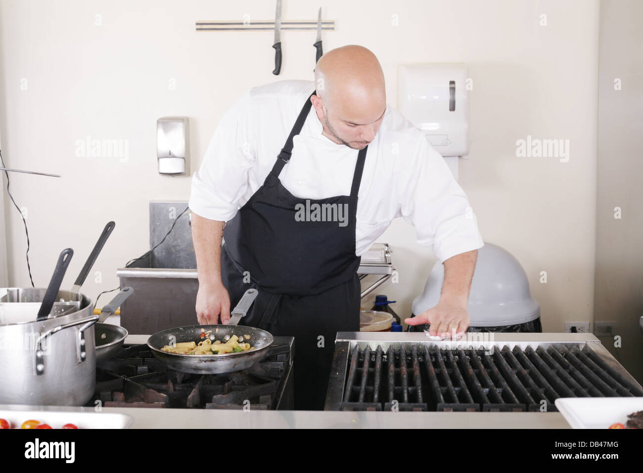 professional chef cleaning the kitchen Stock Photo - Alamy