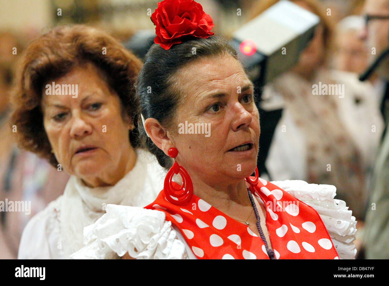 Spanish woman singing during Catholic mass and wearing gypsy flamenco ...