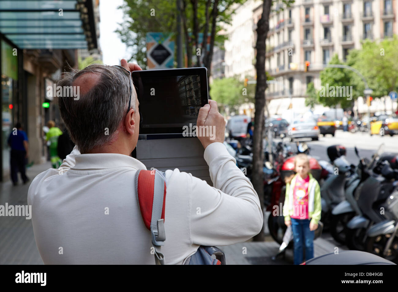 People Taking Pictures With Ipads