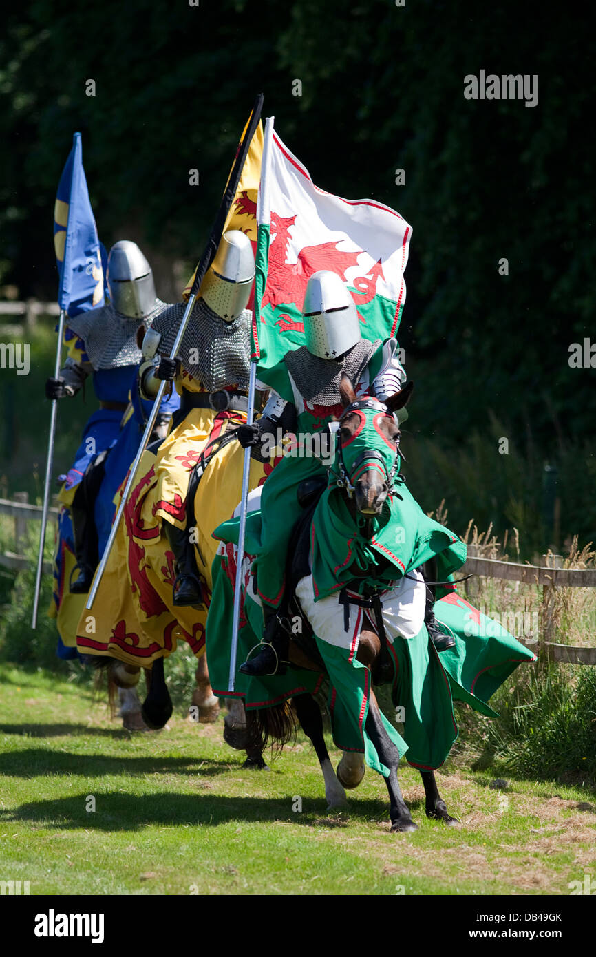 Three Knights riding into the field during a Medieval re-enactment ...