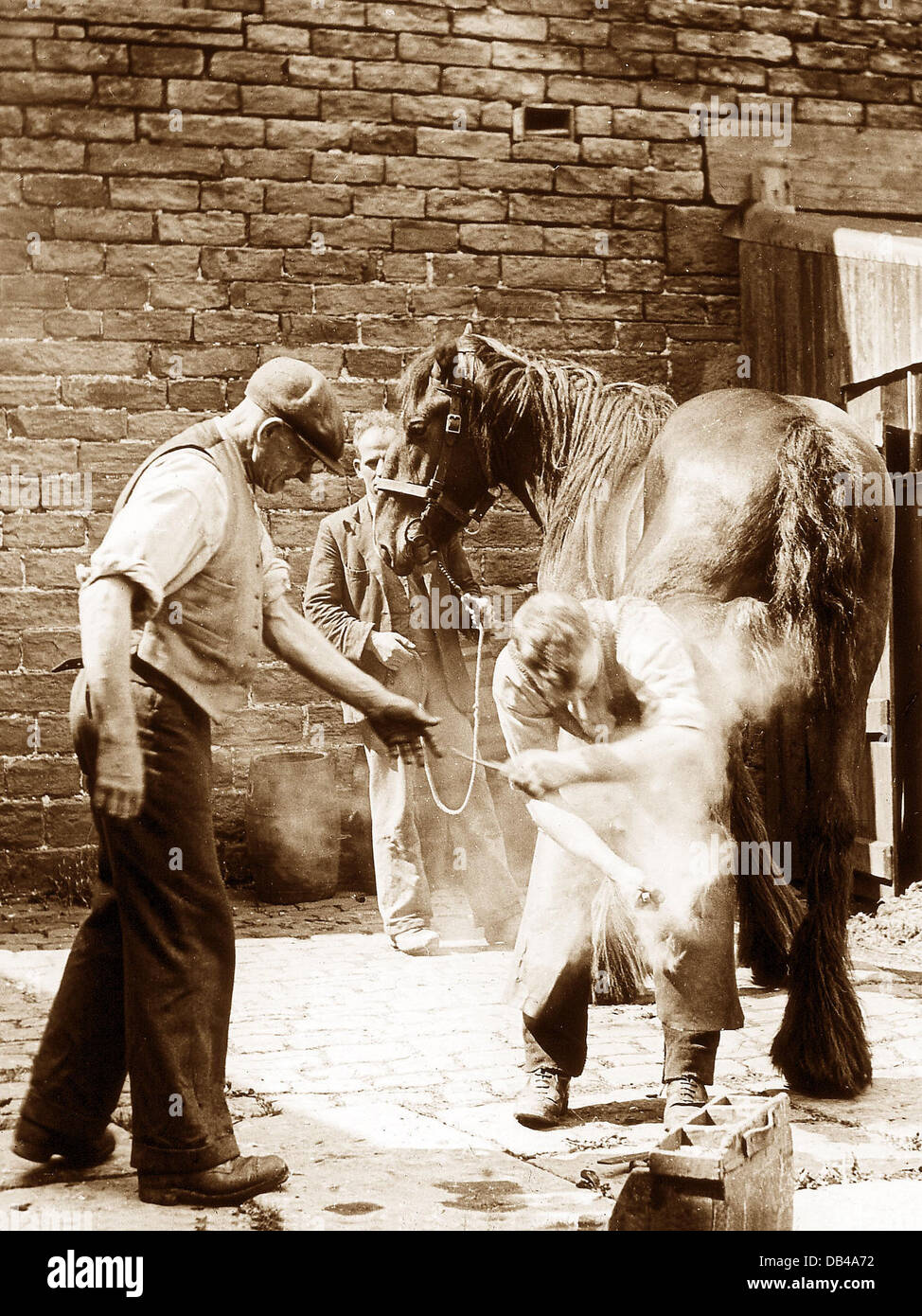 Blacksmith early 1900s Stock Photo - Alamy