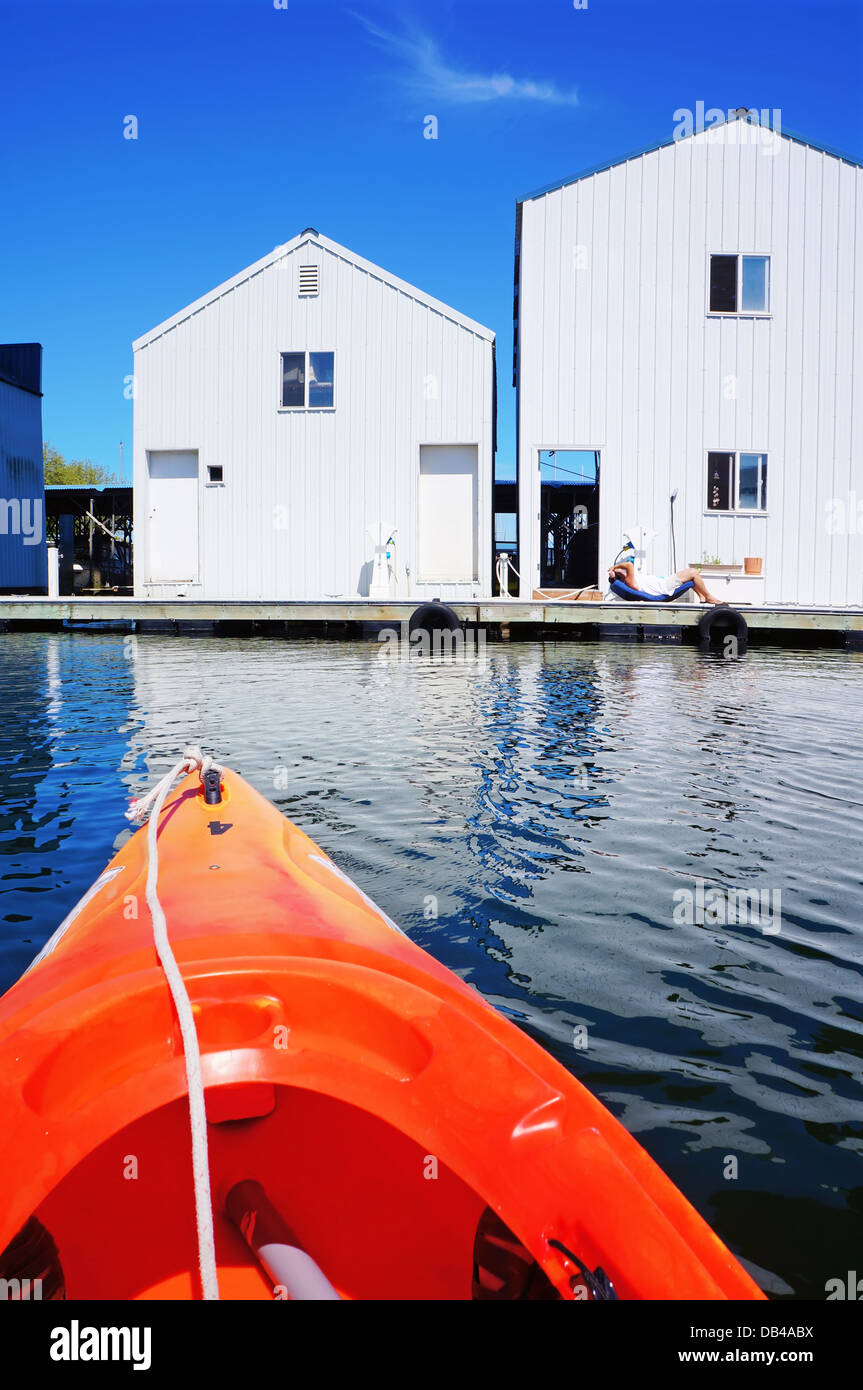 Boat house in Tacoma, WA and orange kayak Stock Photo - Alamy