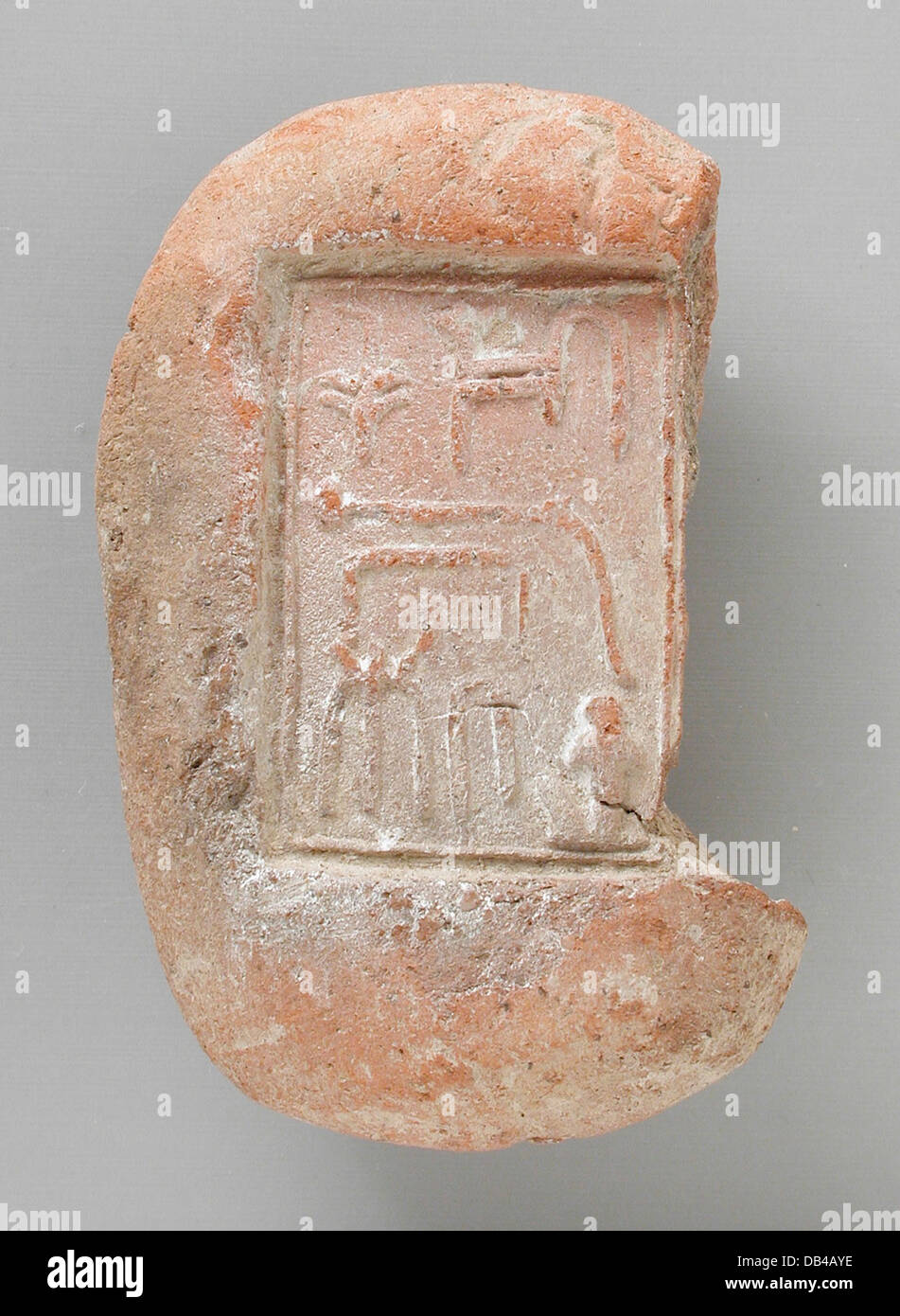 This ancient mold features the titles and name of a scribe, providing ...
