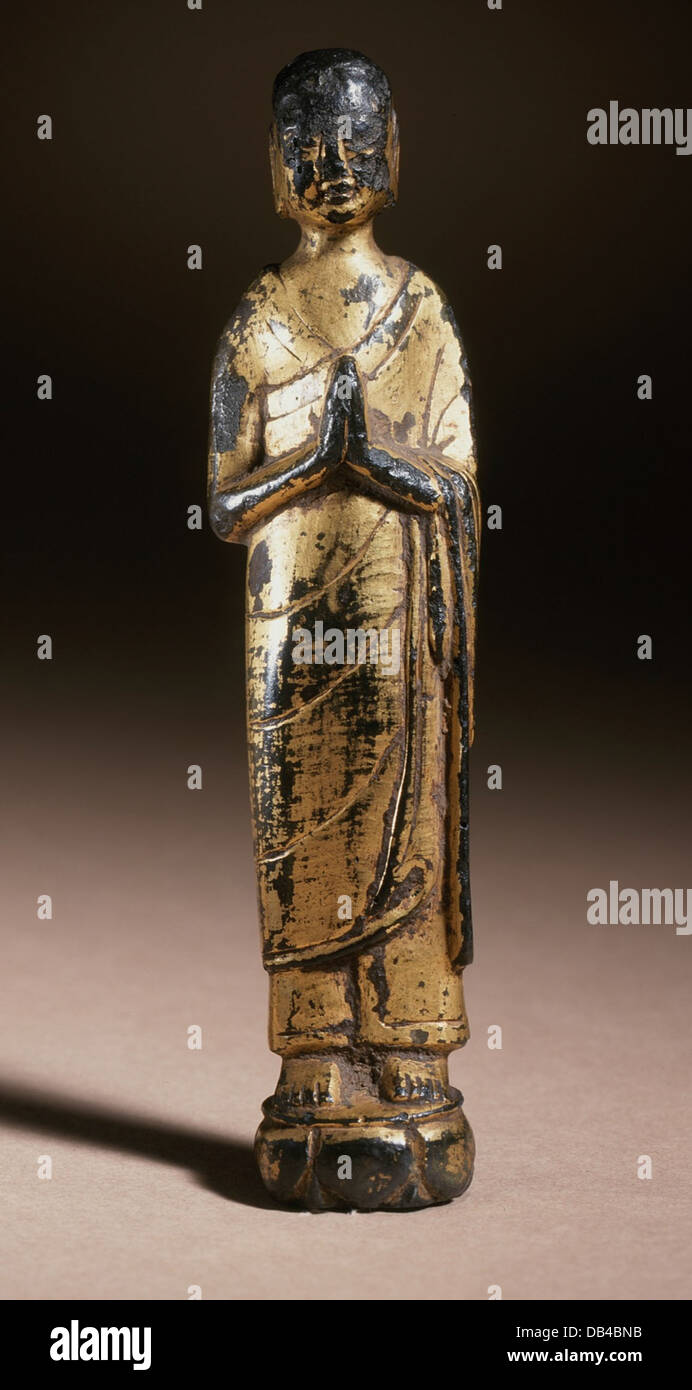 This statue represents a monk in a meditative pose, crafted from a ...