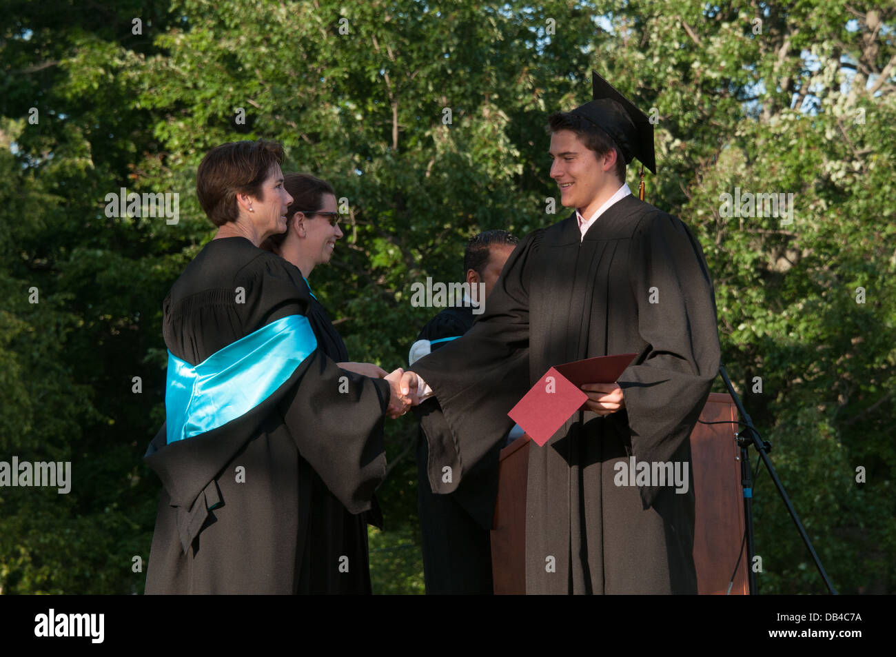 High school student receiving his diploma Stock Photo - Alamy