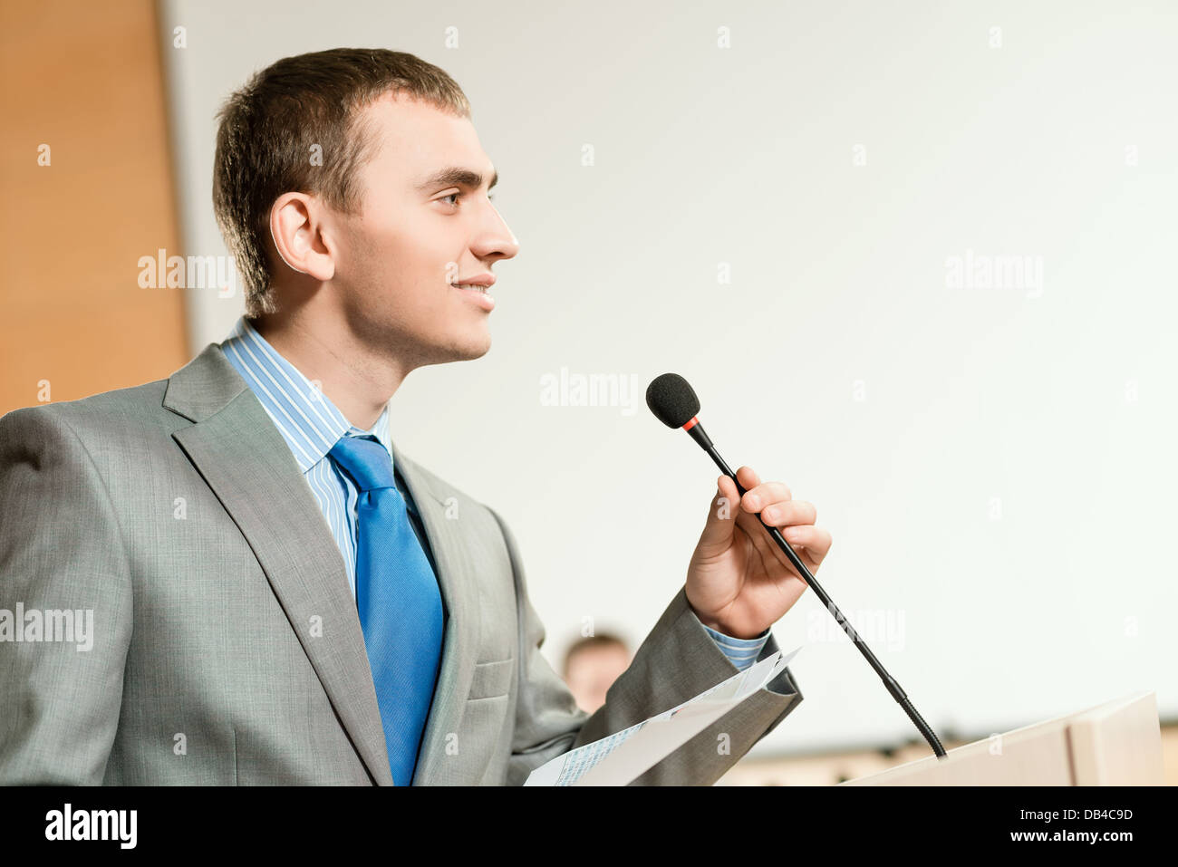 Man holding microphone hi-res stock photography and images - Alamy