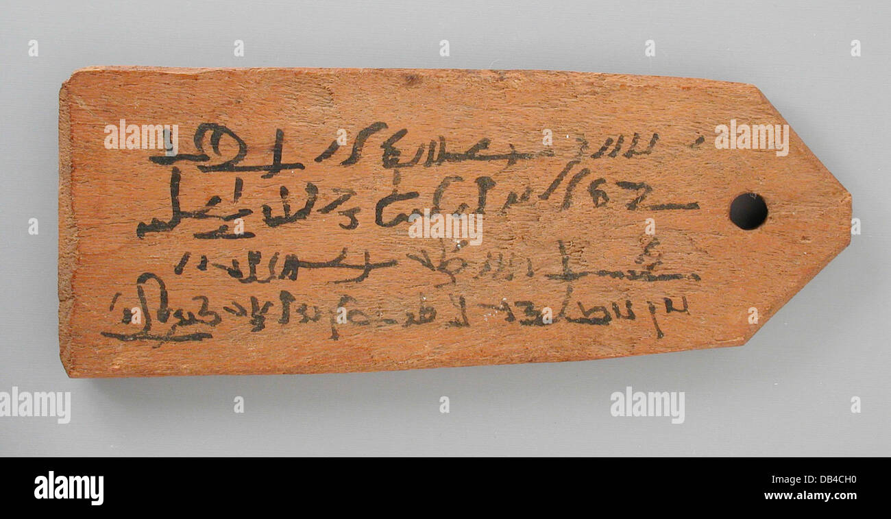 This mummy label, inscribed with demotic writing on both sides, was ...