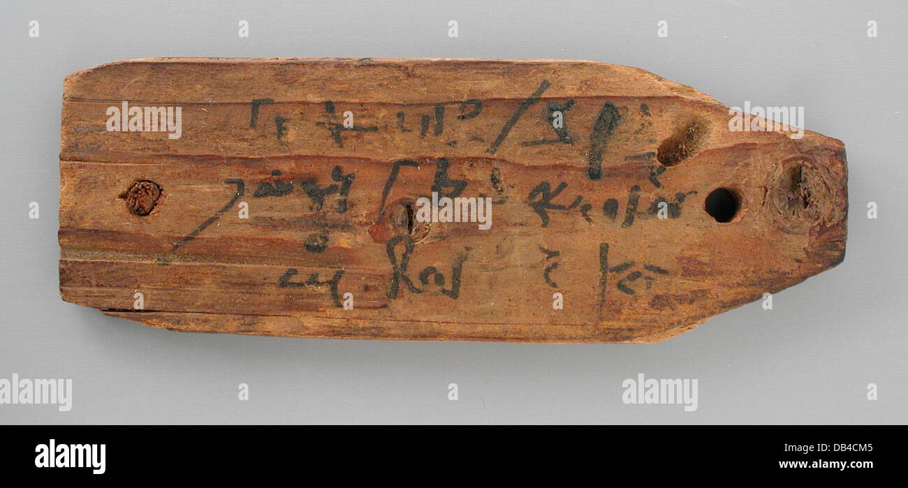 This Egyptian mummy label features a Demotic inscription, offering ...