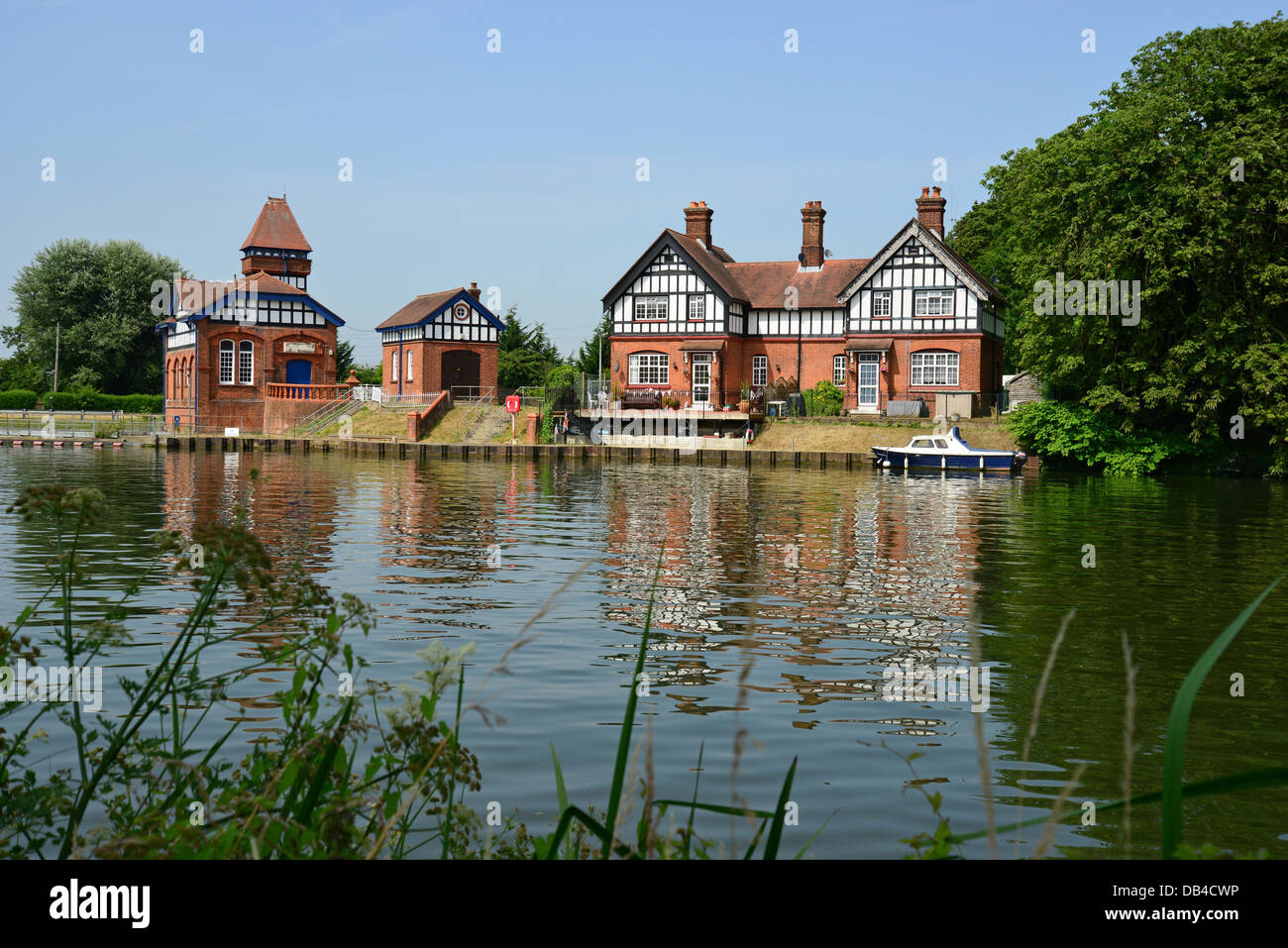 Mock Tudor house and pump house on River Thames, Runnymede, Surrey ...