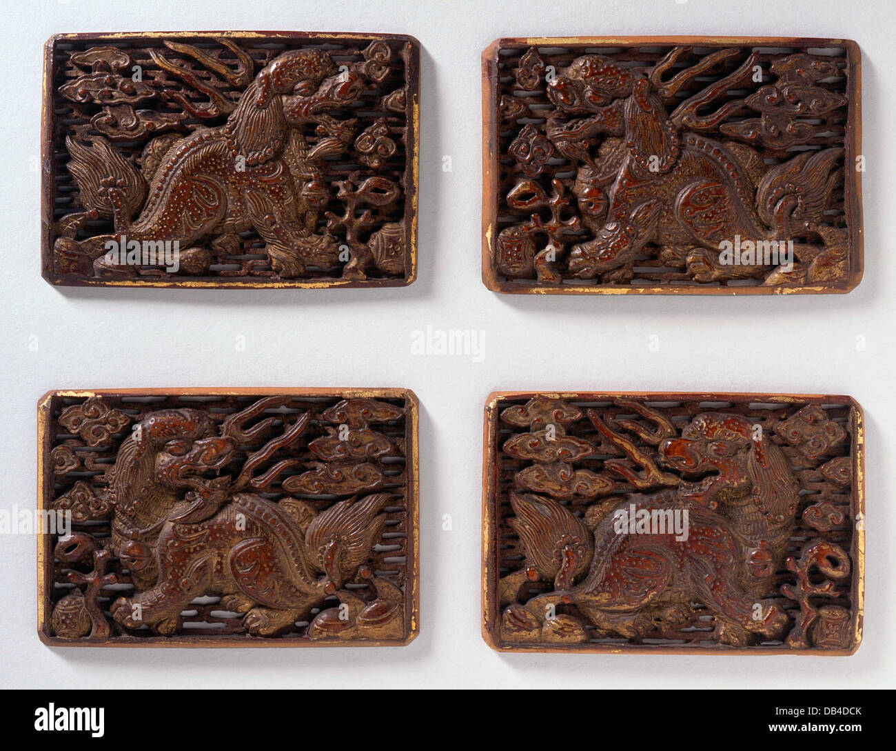 This collection of nineteen belt ornaments, crafted in bronze, is a ...