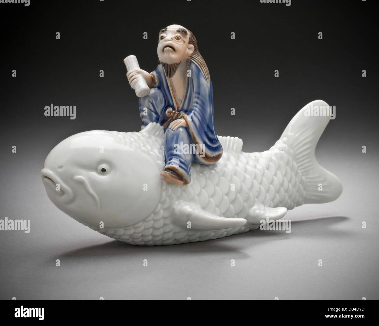Okimono in the form of kinko riding the carp hi-res stock photography ...