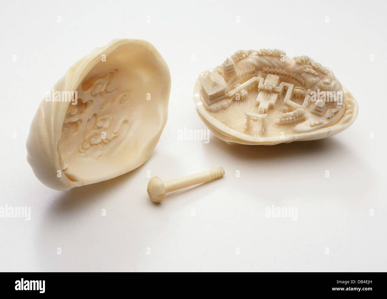 This oyster shell, intricately carved to depict a view of the ...