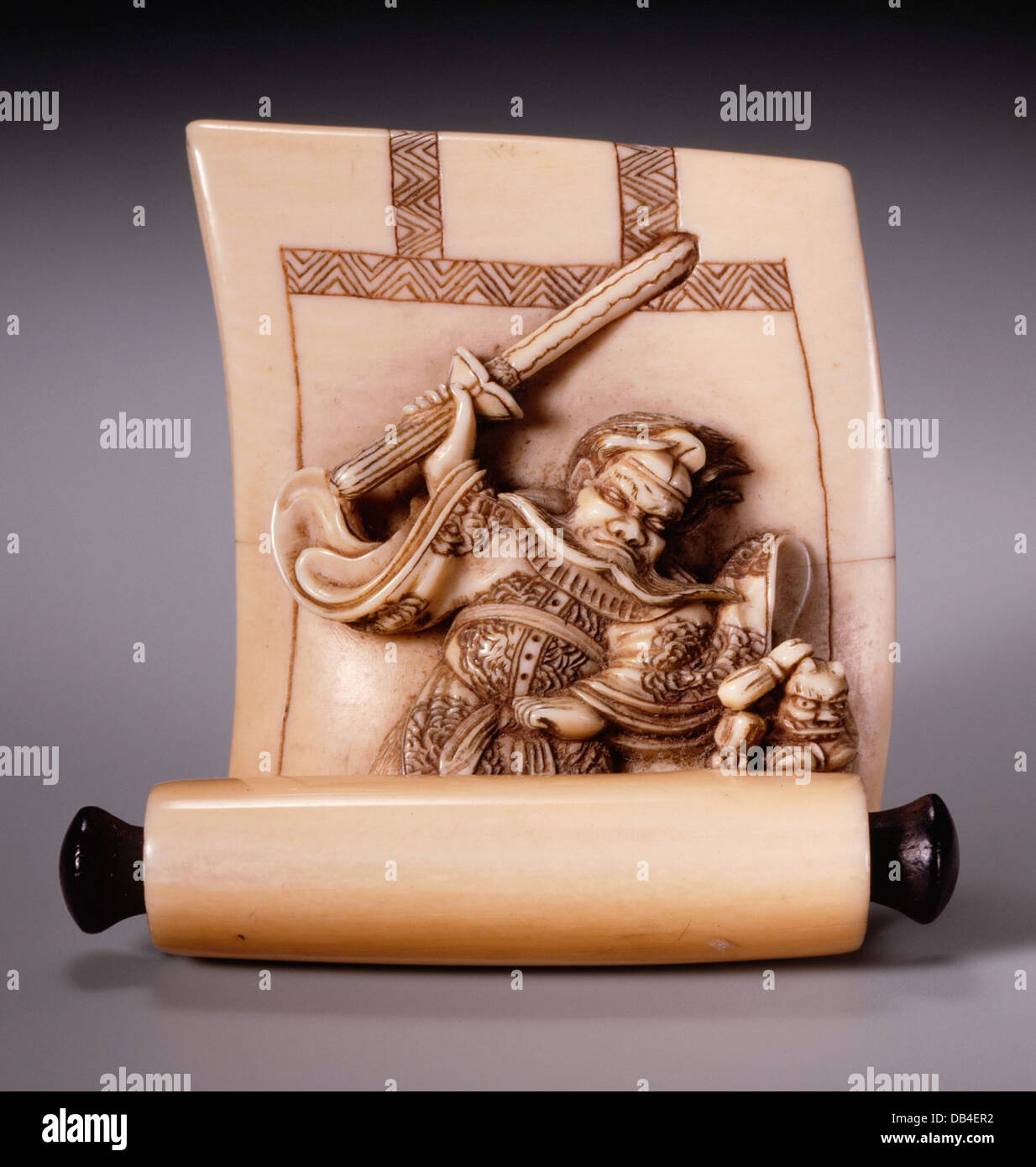 A painted scroll depicting Shoki, a mythological figure, attacking a ...