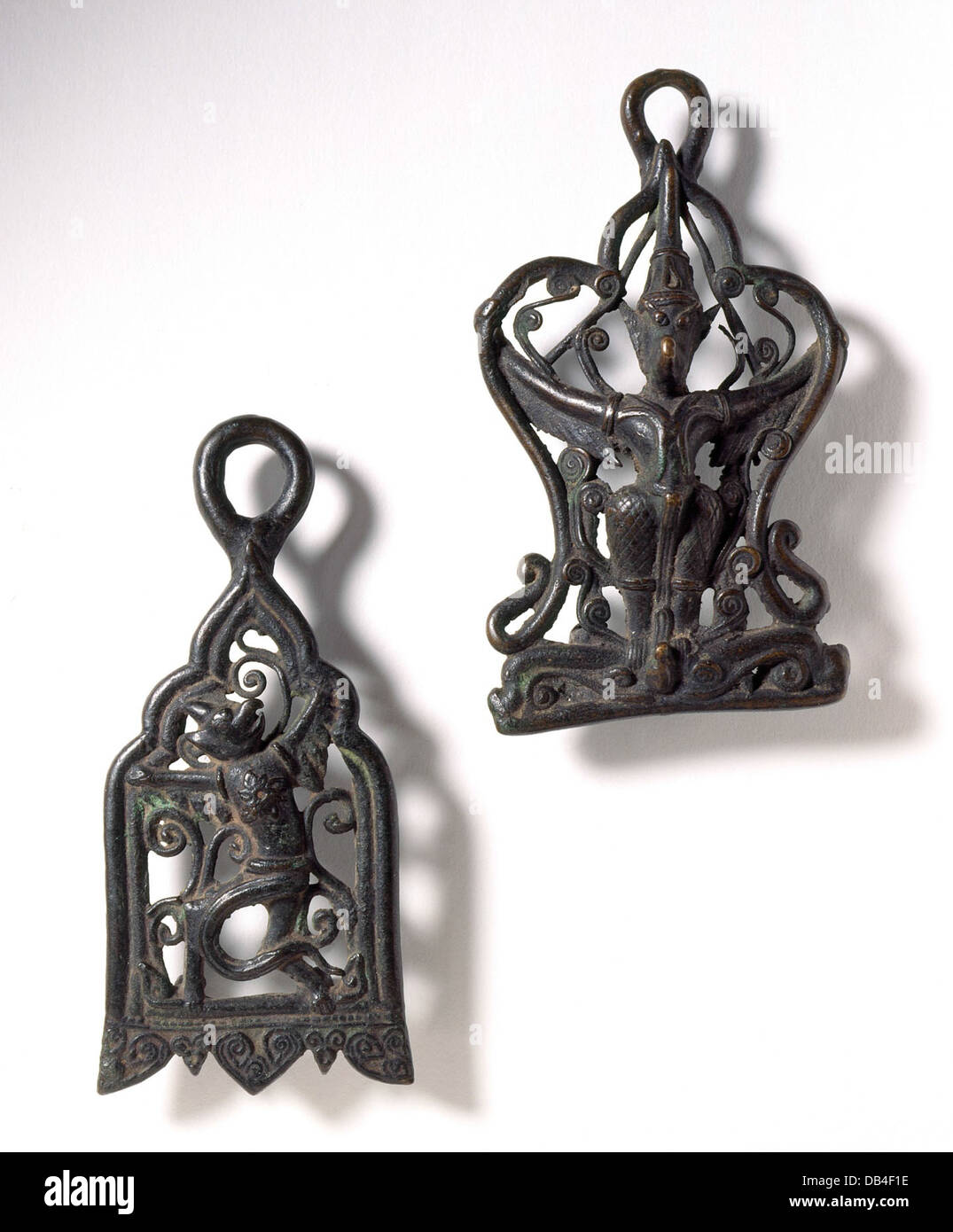 This pair of horse trappings features detailed representations of ...