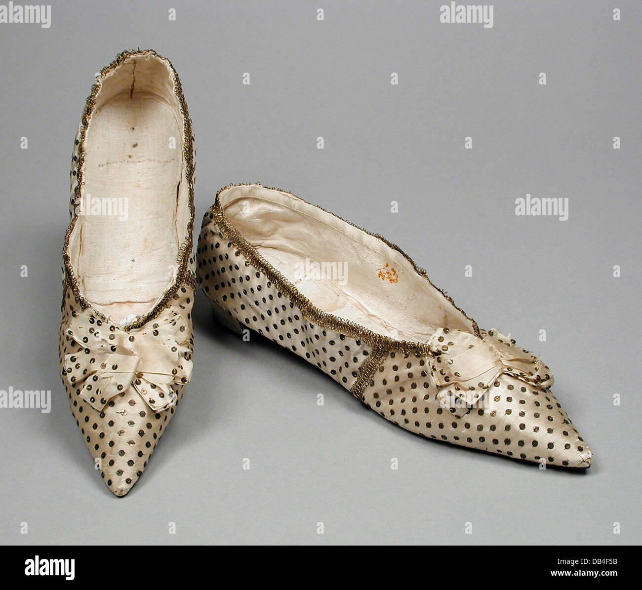 This pair of woman's shoes, an example of fashion from the past, is ...
