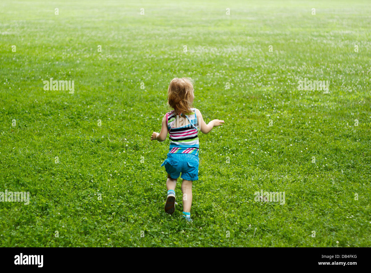 Girl happy skipping hi-res stock photography and images - Alamy