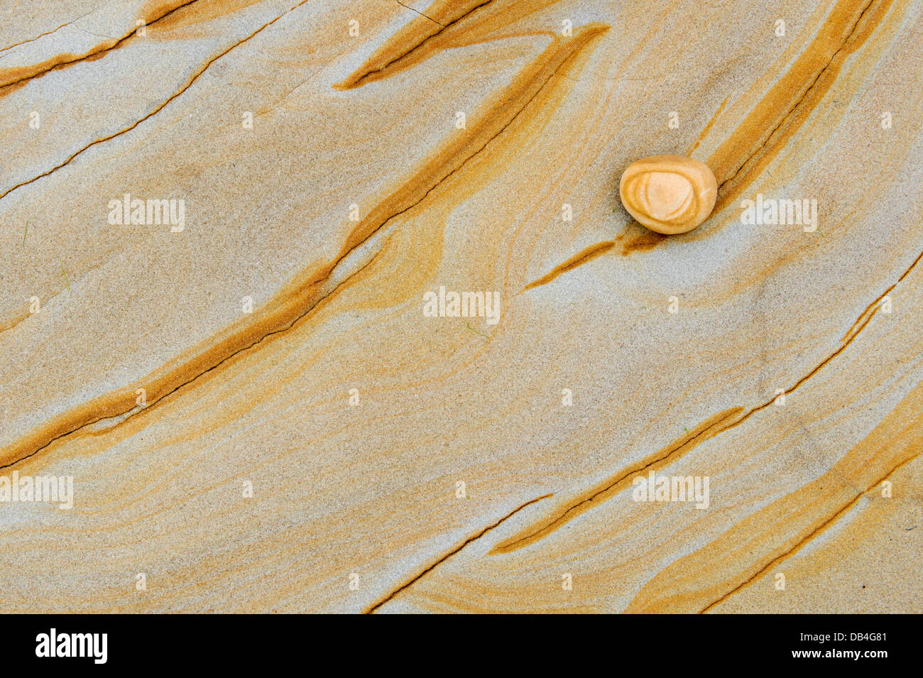 Sandstone rock strata pattern and pebble. Northumberland Coastline ...