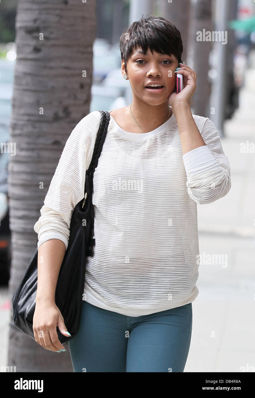 Eddie Murphy's daughter, Bria Murphy, running errands while chatting on ...