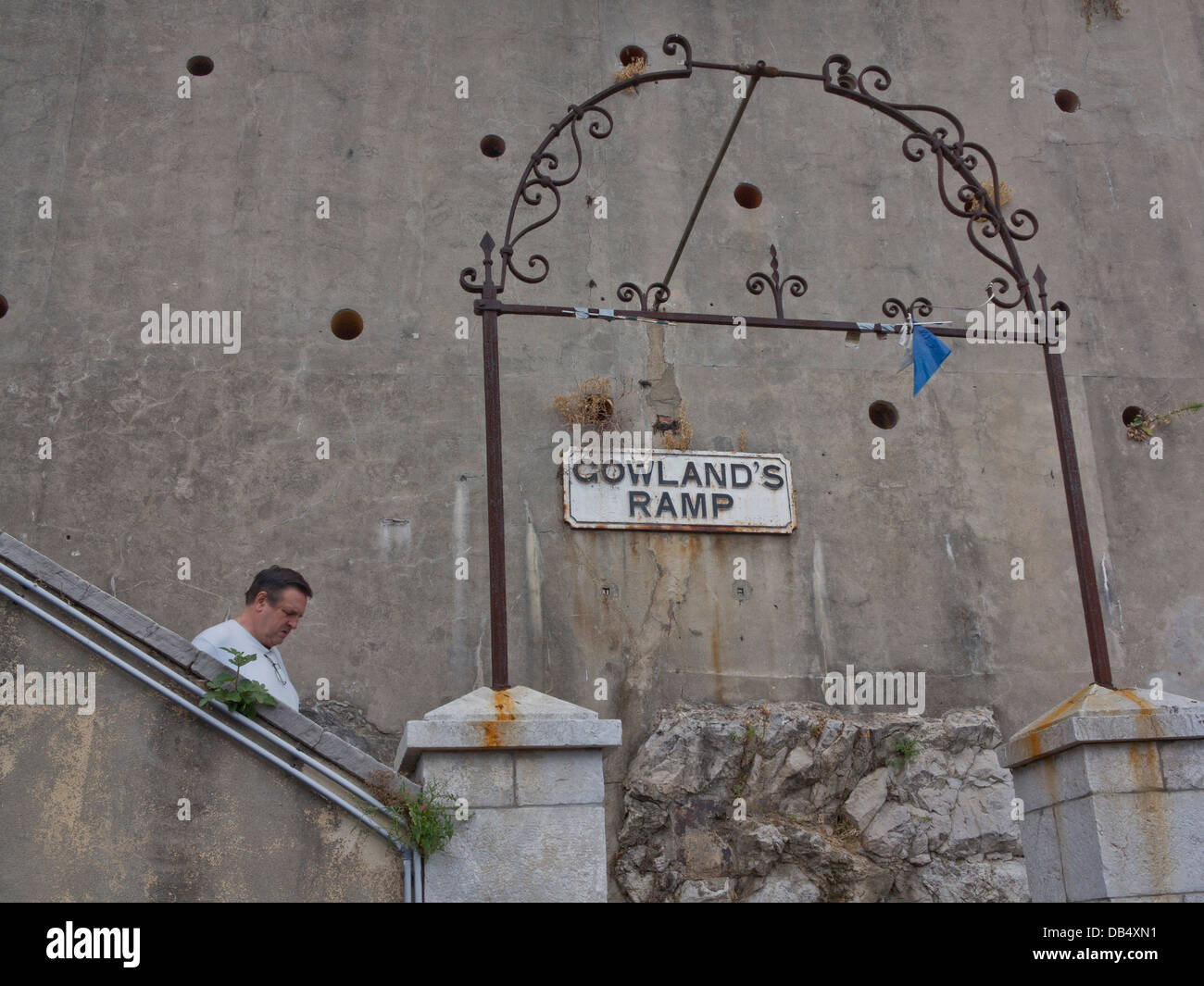 Man walking down a ramp in the old town in Gibraltar Stock Photo - Alamy