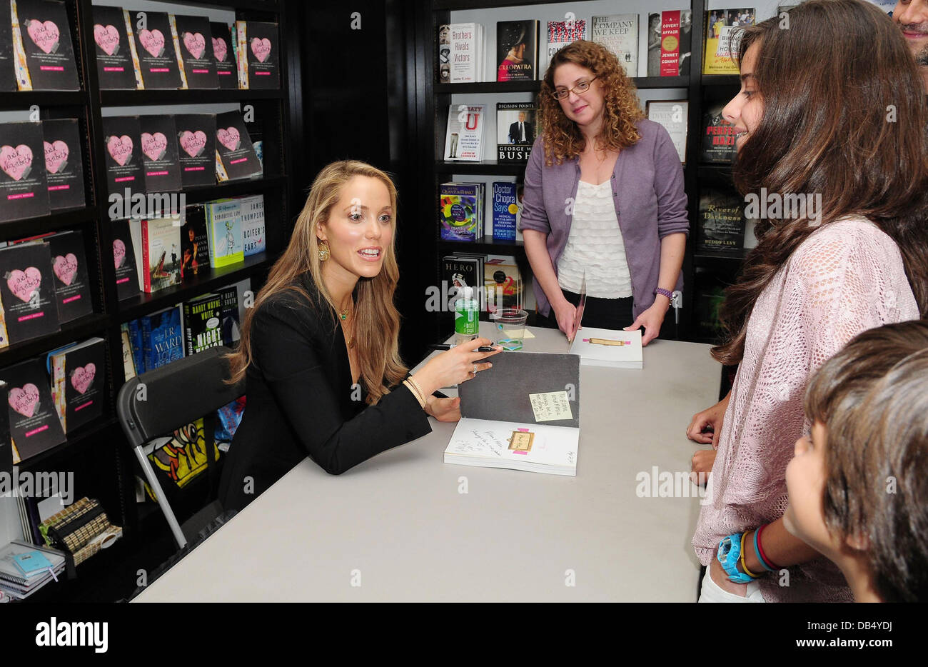 Actress Elizabeth Berkley signs copies of 'Ask Elizabeth' at Books and ...