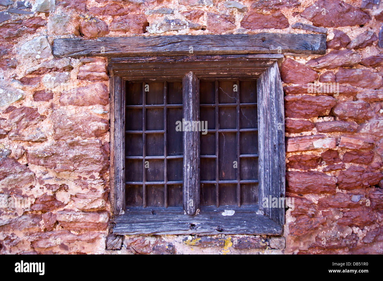 Mediaeval timber-framed leaded window in a stone building, Somerset ...