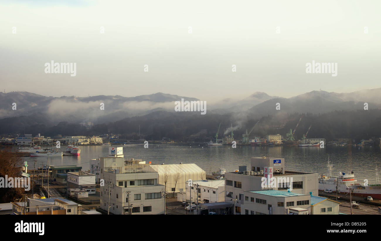 Aerial high angle view of Kesennuma city and its fishing port revealing ...
