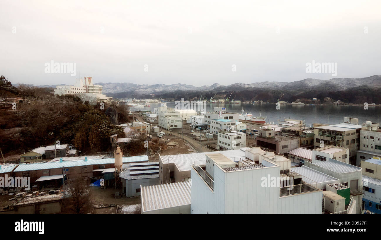 Aerial high angle view of Kesennuma city and its fishing port revealing ...