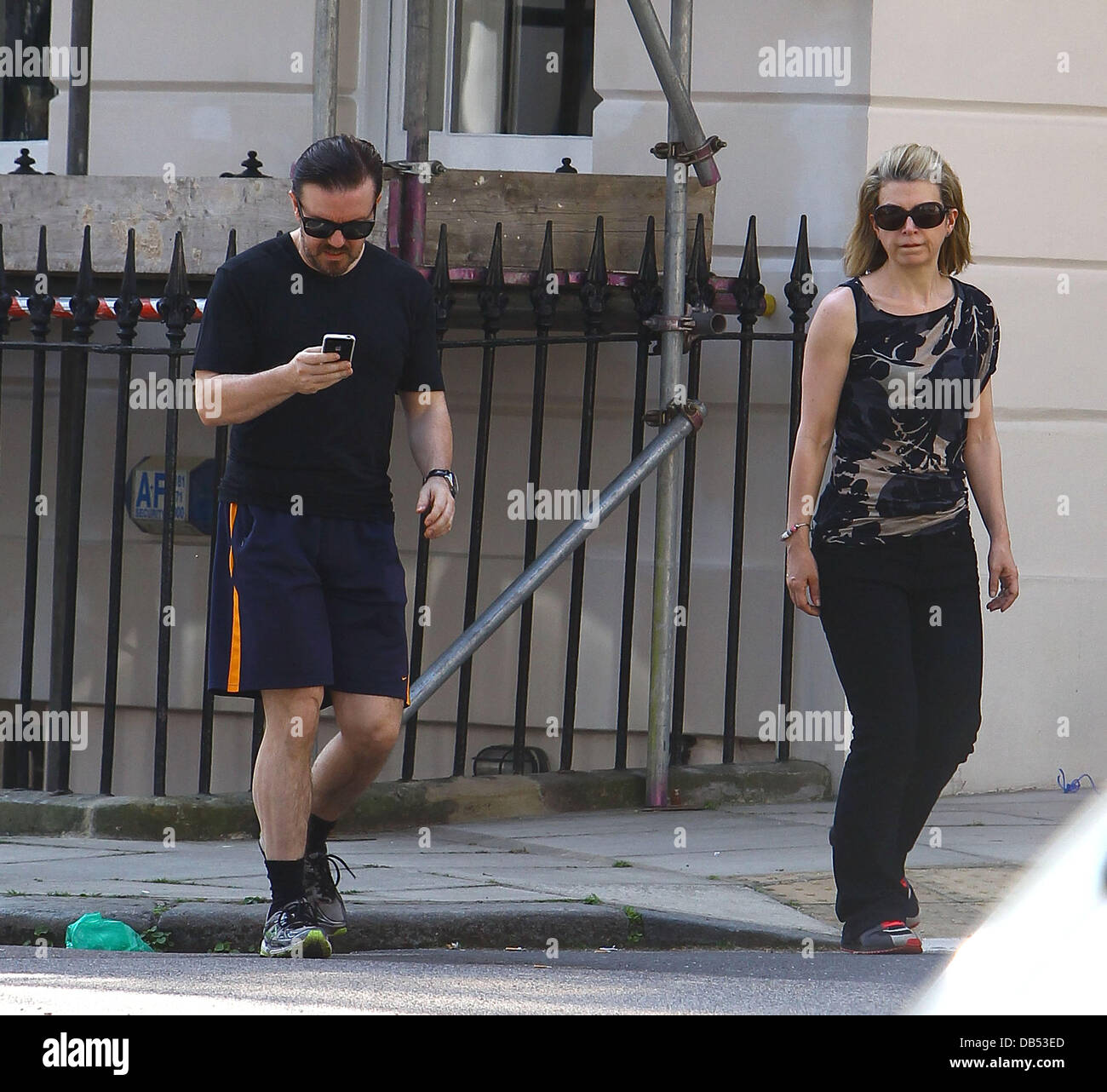 Ricky Gervais and his girlfriend Jane Fallon take a walk through a ...