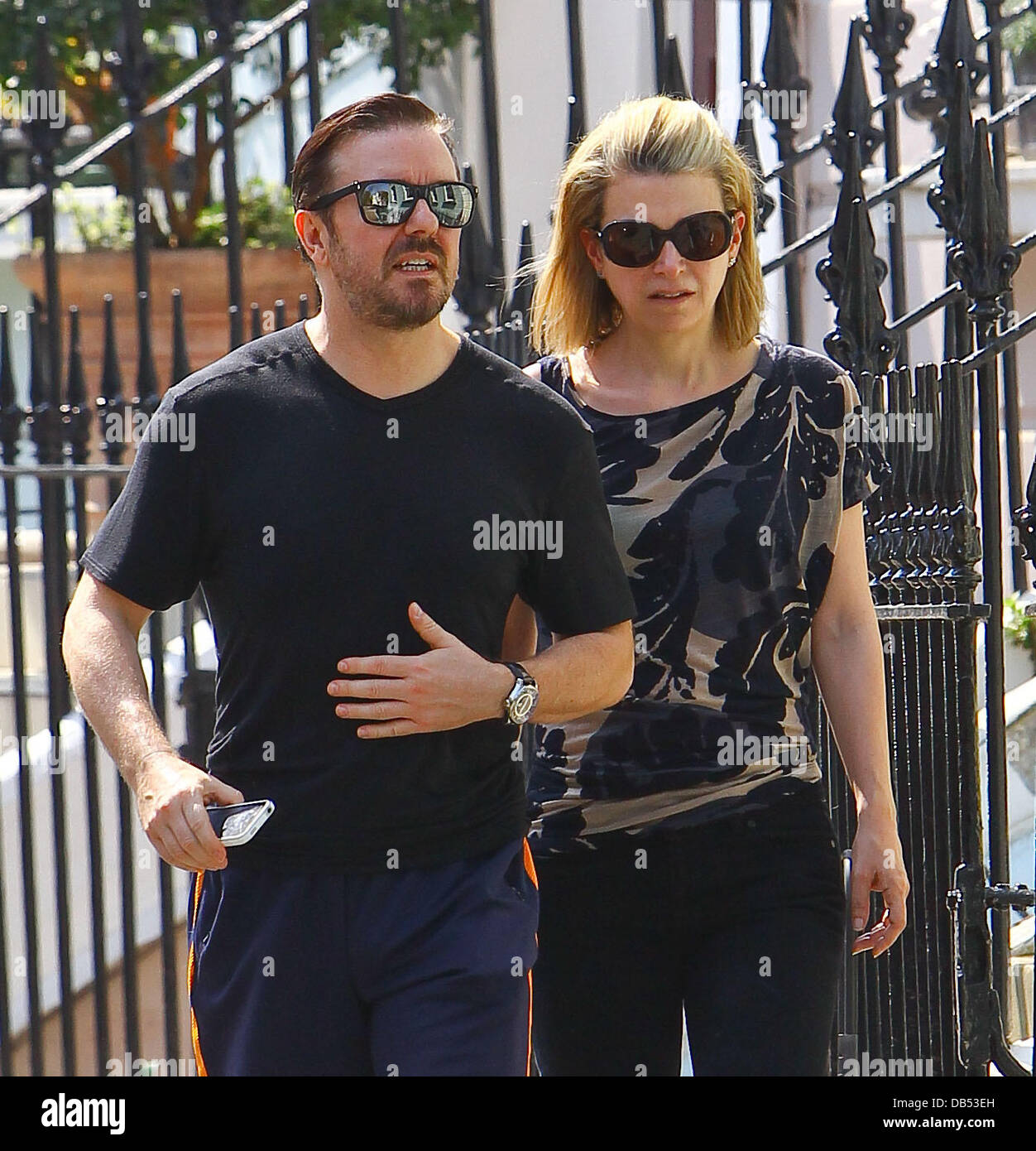 Ricky Gervais and his girlfriend Jane Fallon take a walk through a ...