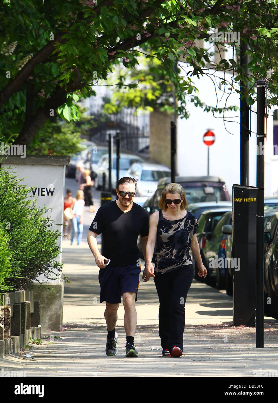 Ricky Gervais and his girlfriend Jane Fallon take a walk through a ...