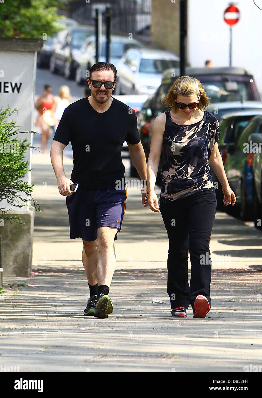 Ricky Gervais and his girlfriend Jane Fallon take a walk through a ...