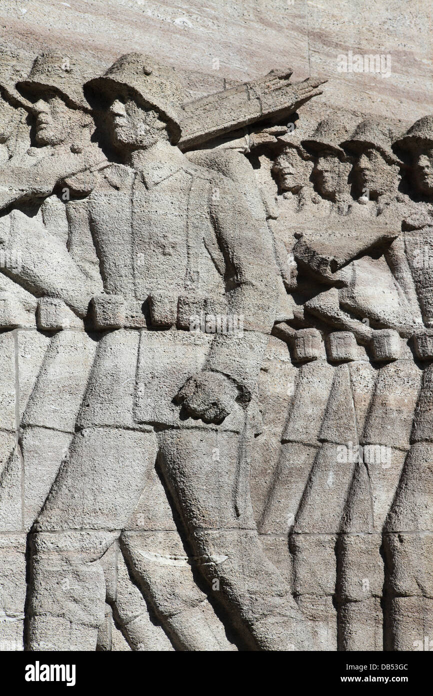 Bas relief figures of soldiers on the war memorial to infantry regiment ...