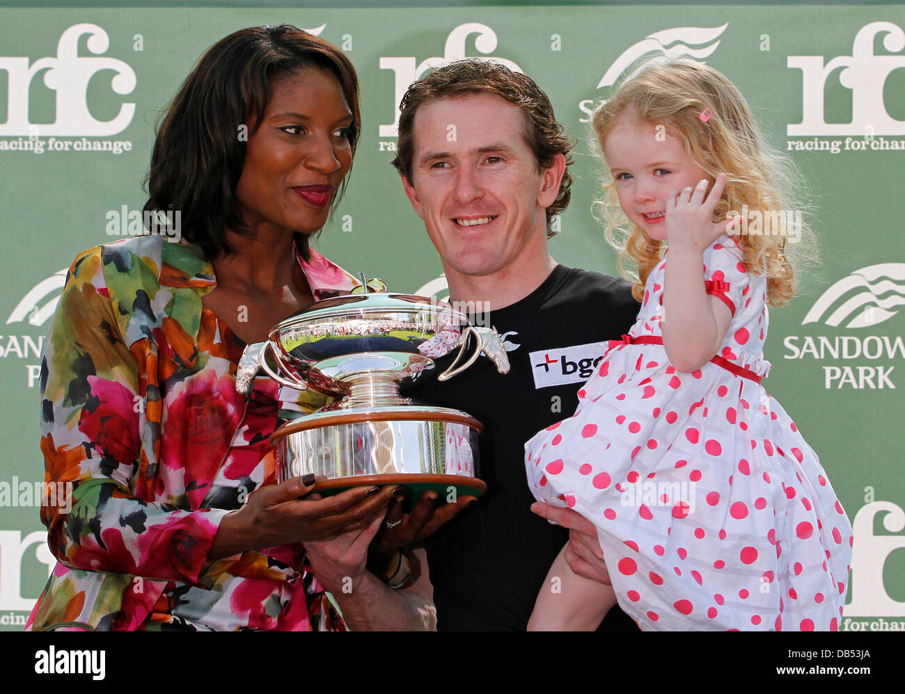 Denise Lewis, Tony McCoy and his daughter Tony McCoy receives a trophy ...