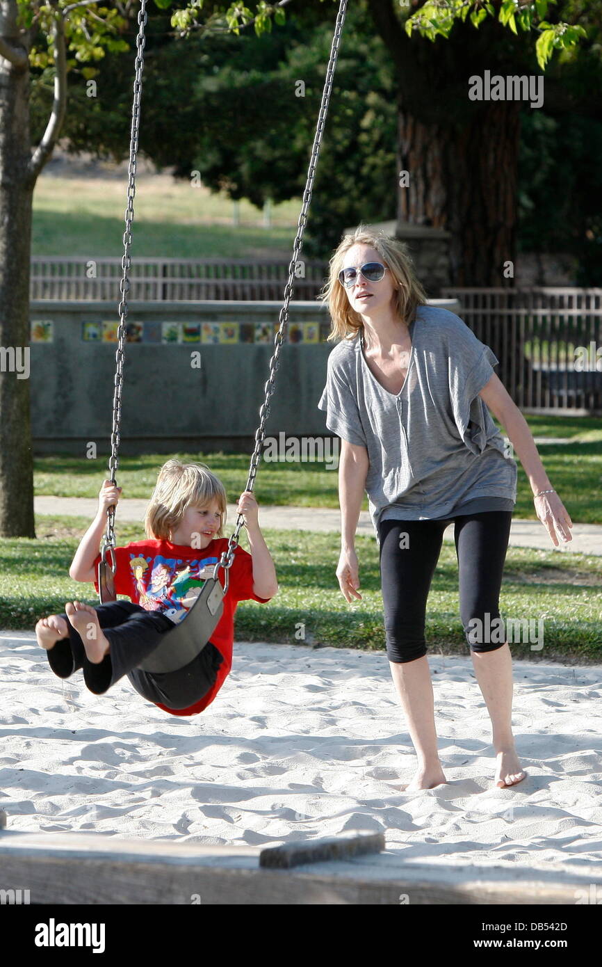 Sharon Stone Pushes her son Quinn Stone on a swing at a park in Beverly ...