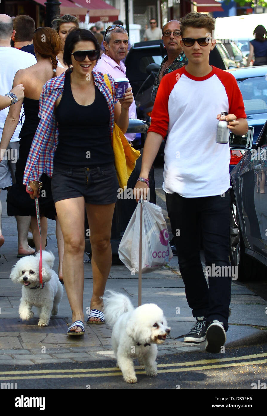 Sadie Frost and her son Rafferty take their dogs for a walk in Primrose ...