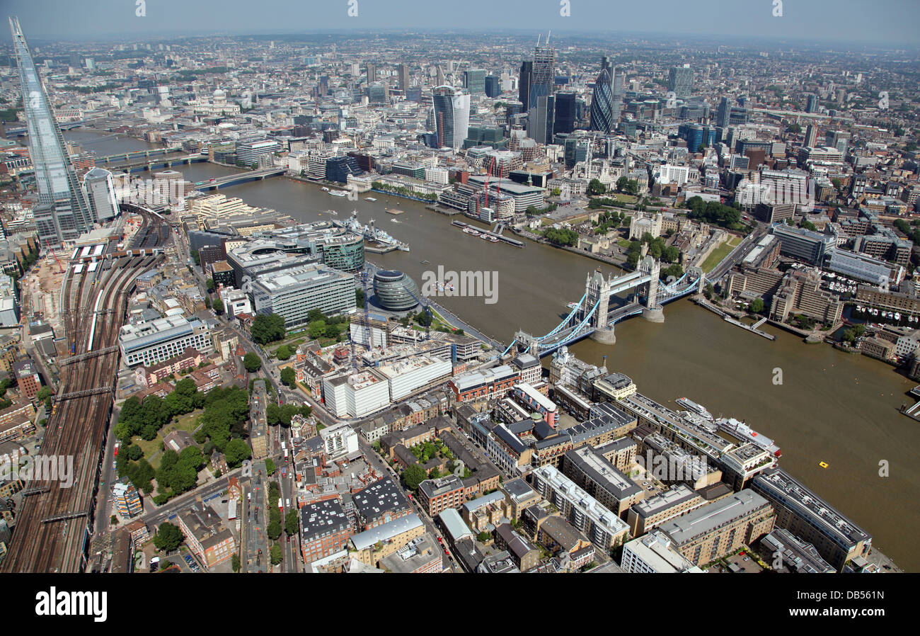 aerial view of The Thames in London with Tower Bridge, The City and ...