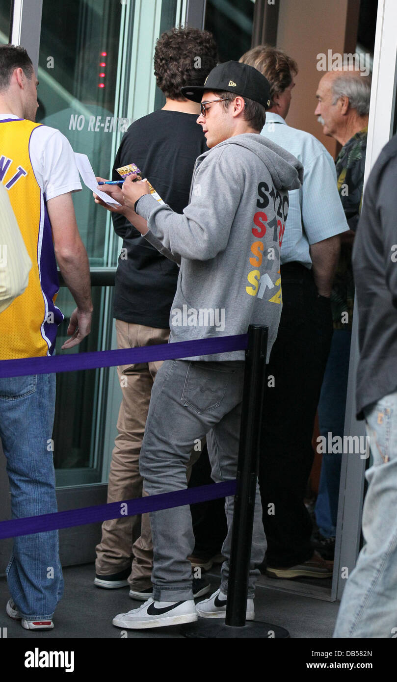 Zac Efron arrives for Game 5 of the 2011 NBA Playoffs between the LA ...