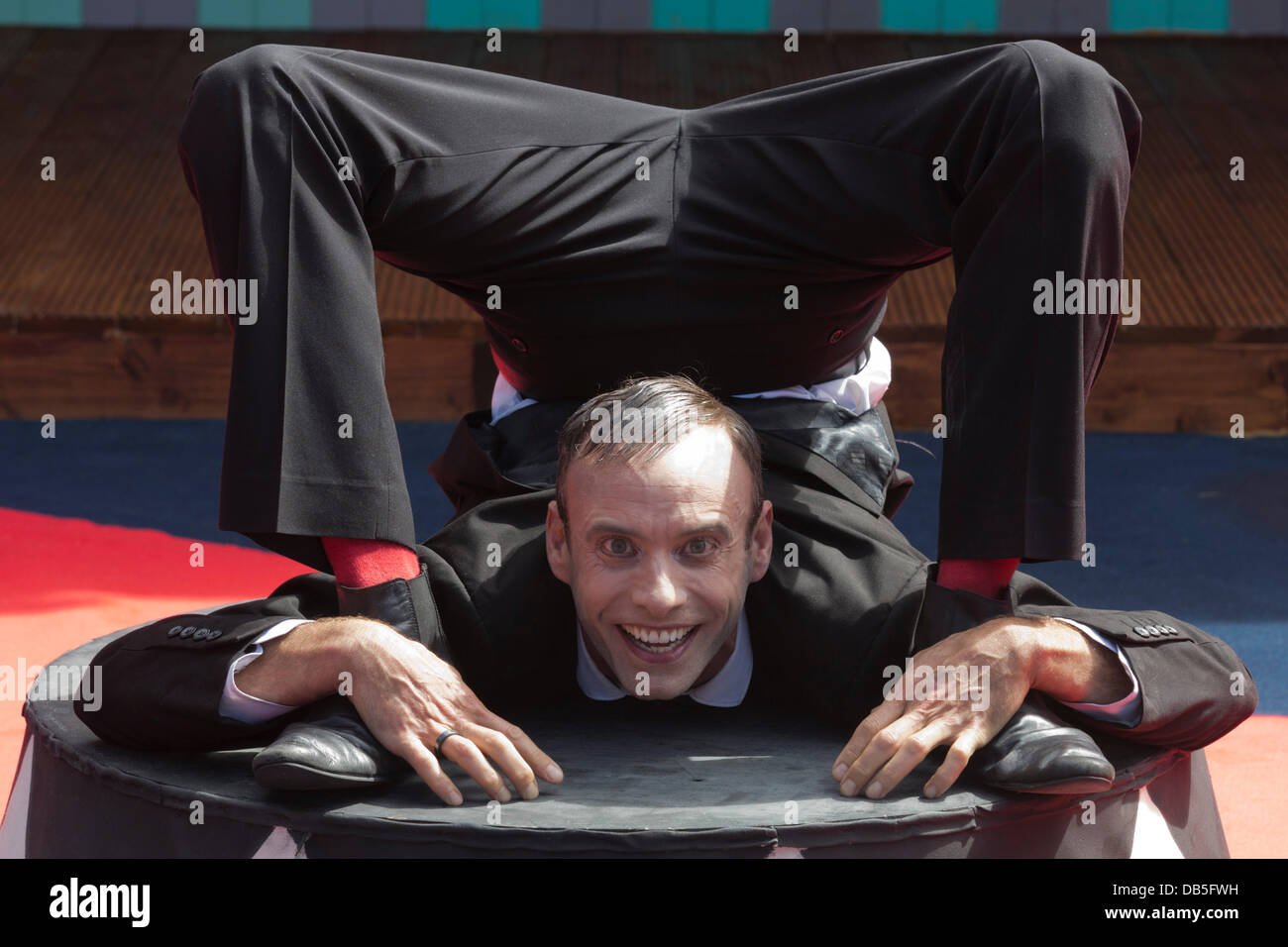 London, UK. 24 July 2013. Photo: Contortionist Jonathan Nosel of the ...