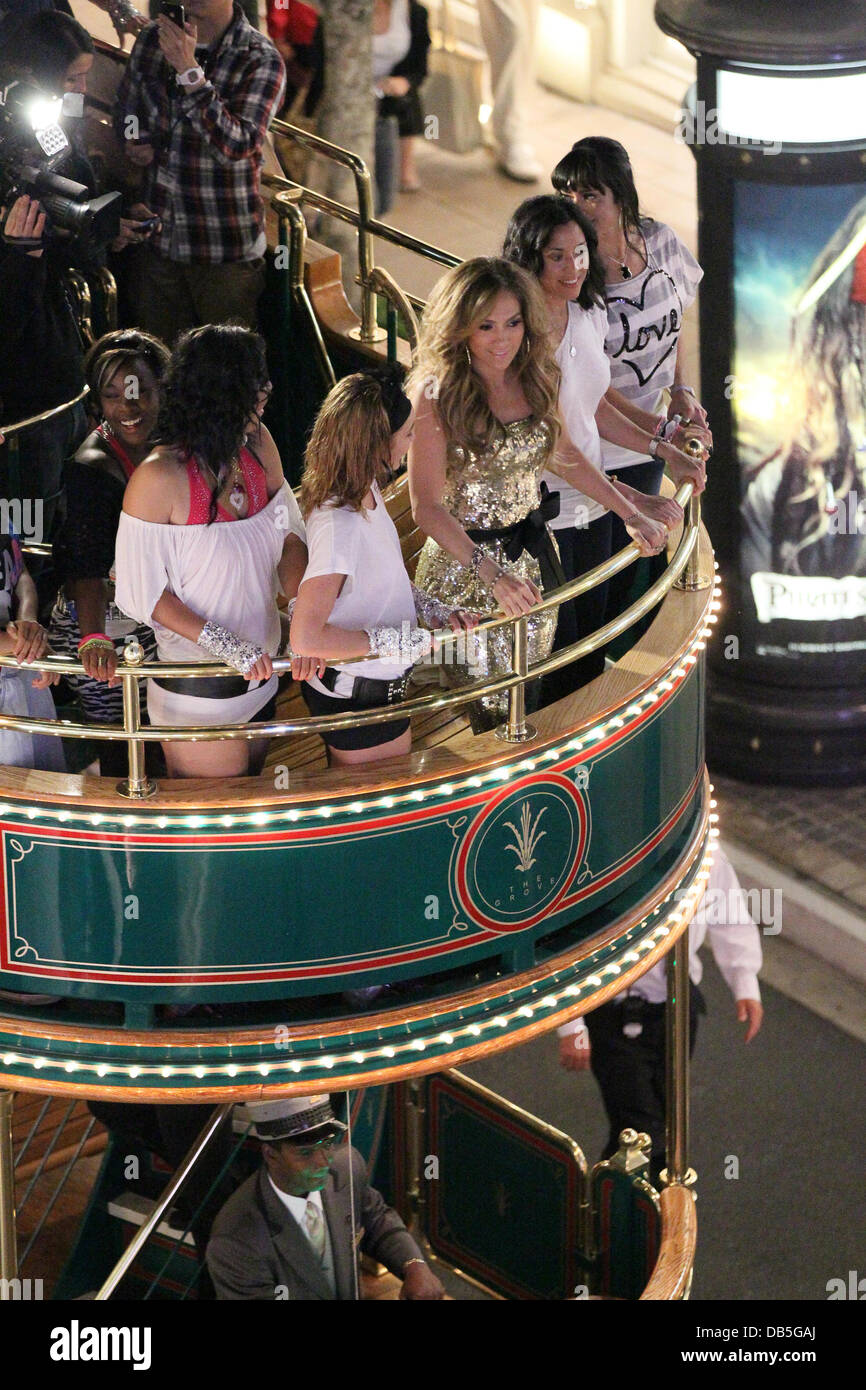 Jennifer Lopez rides into The Grove on a bus with her dancers ahead of ...