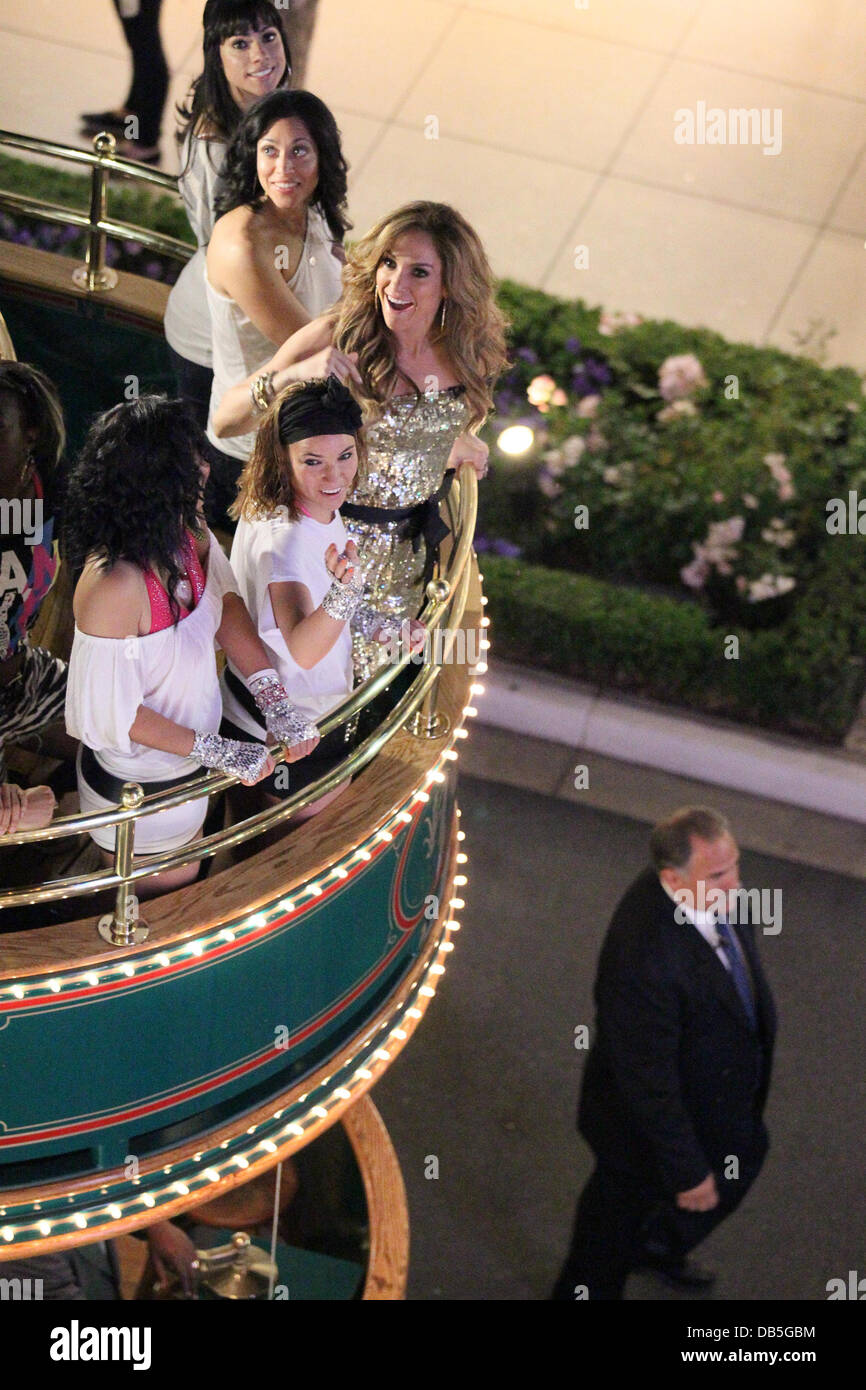 Jennifer Lopez rides into The Grove on a bus with her dancers ahead of ...